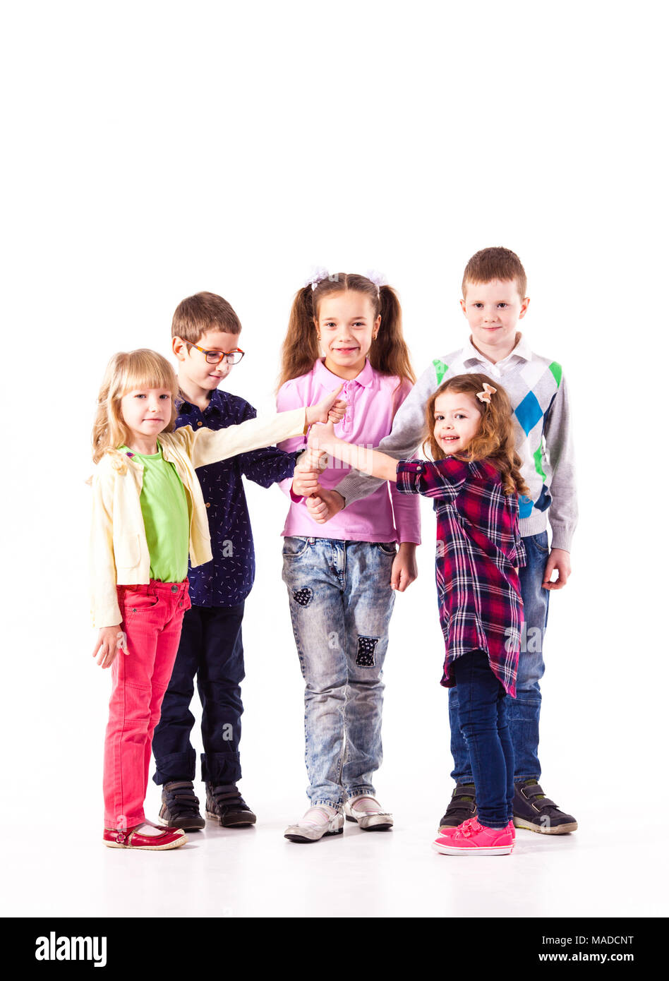 Children with raised hands Stock Photo - Alamy