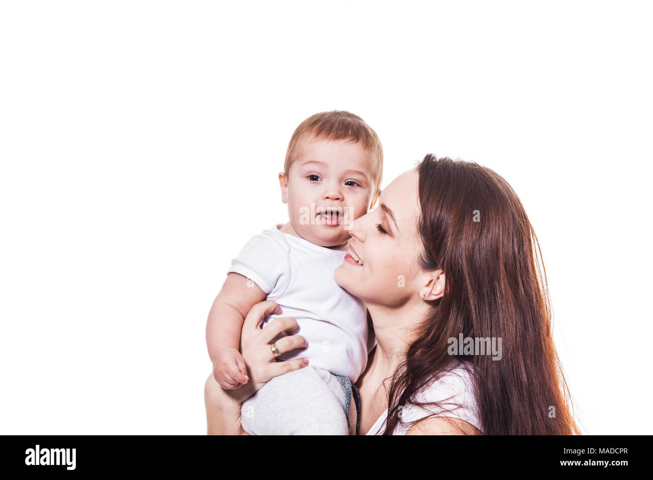 Mother hugs her baby isolated Stock Photo - Alamy