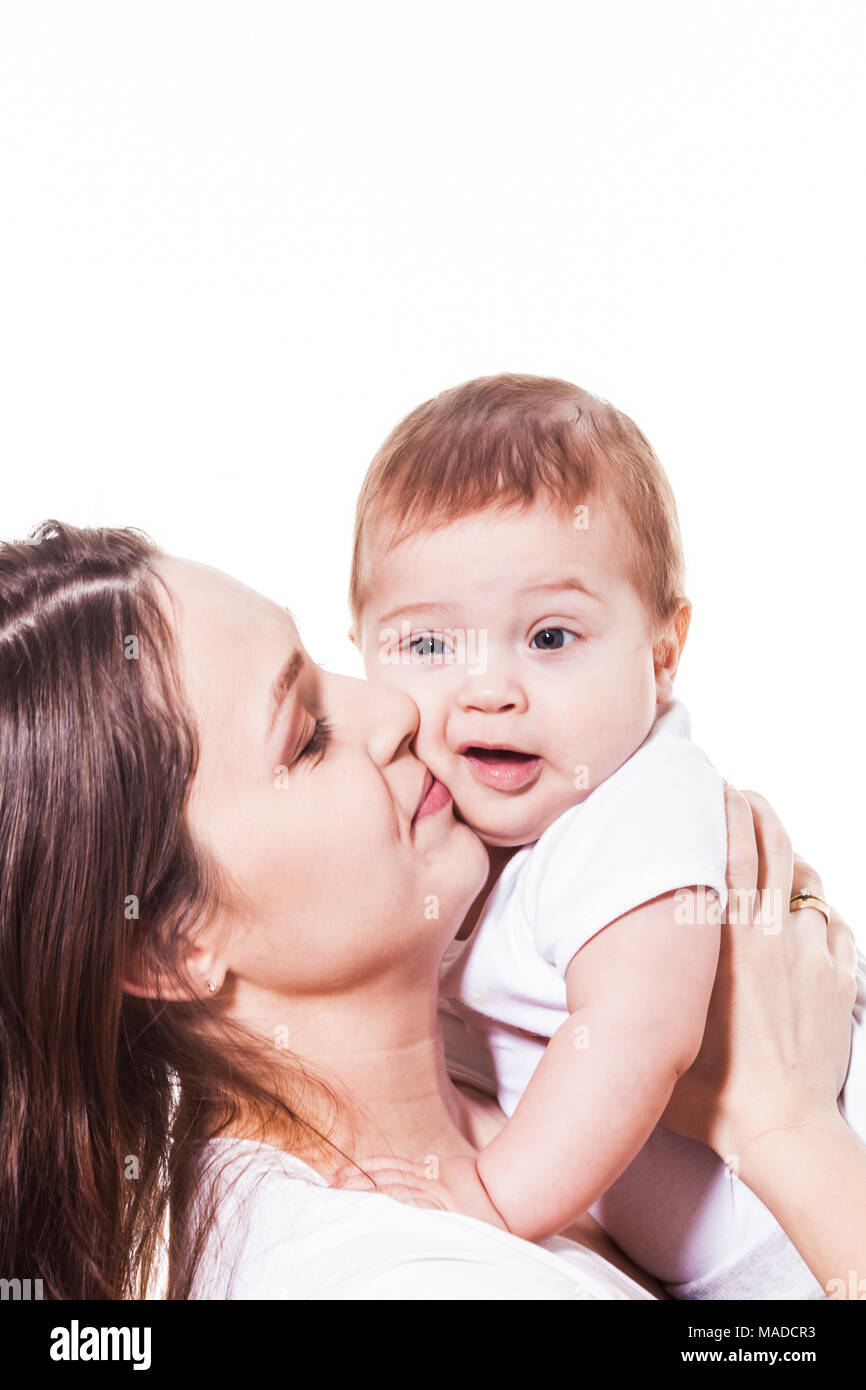 Mother hugs her baby isolated Stock Photo - Alamy