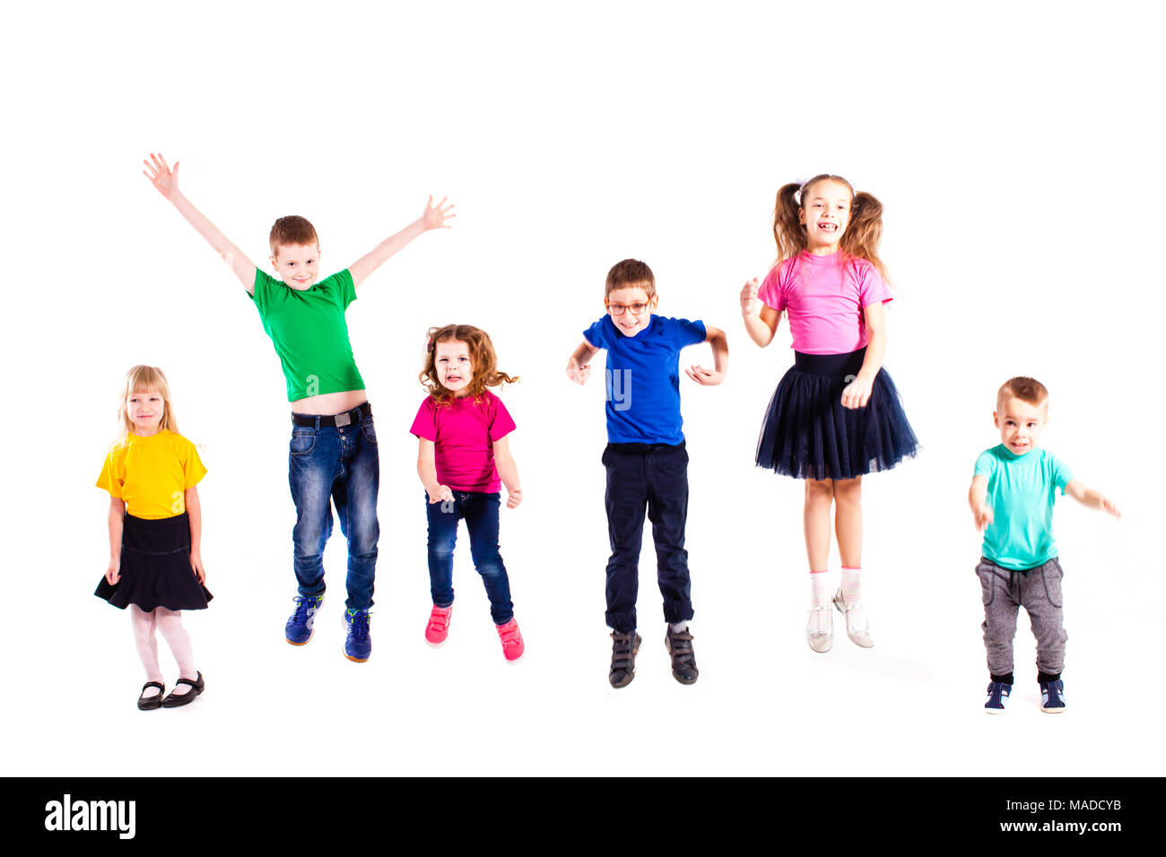 The happy kids jump Stock Photo - Alamy