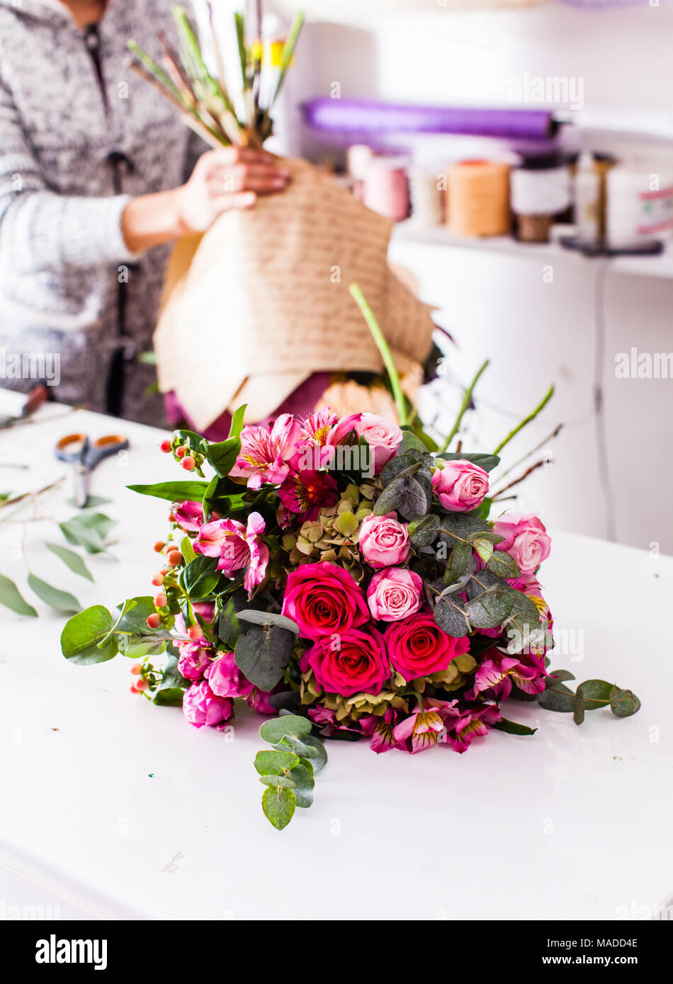 Finished bouquets on the table Stock Photo - Alamy