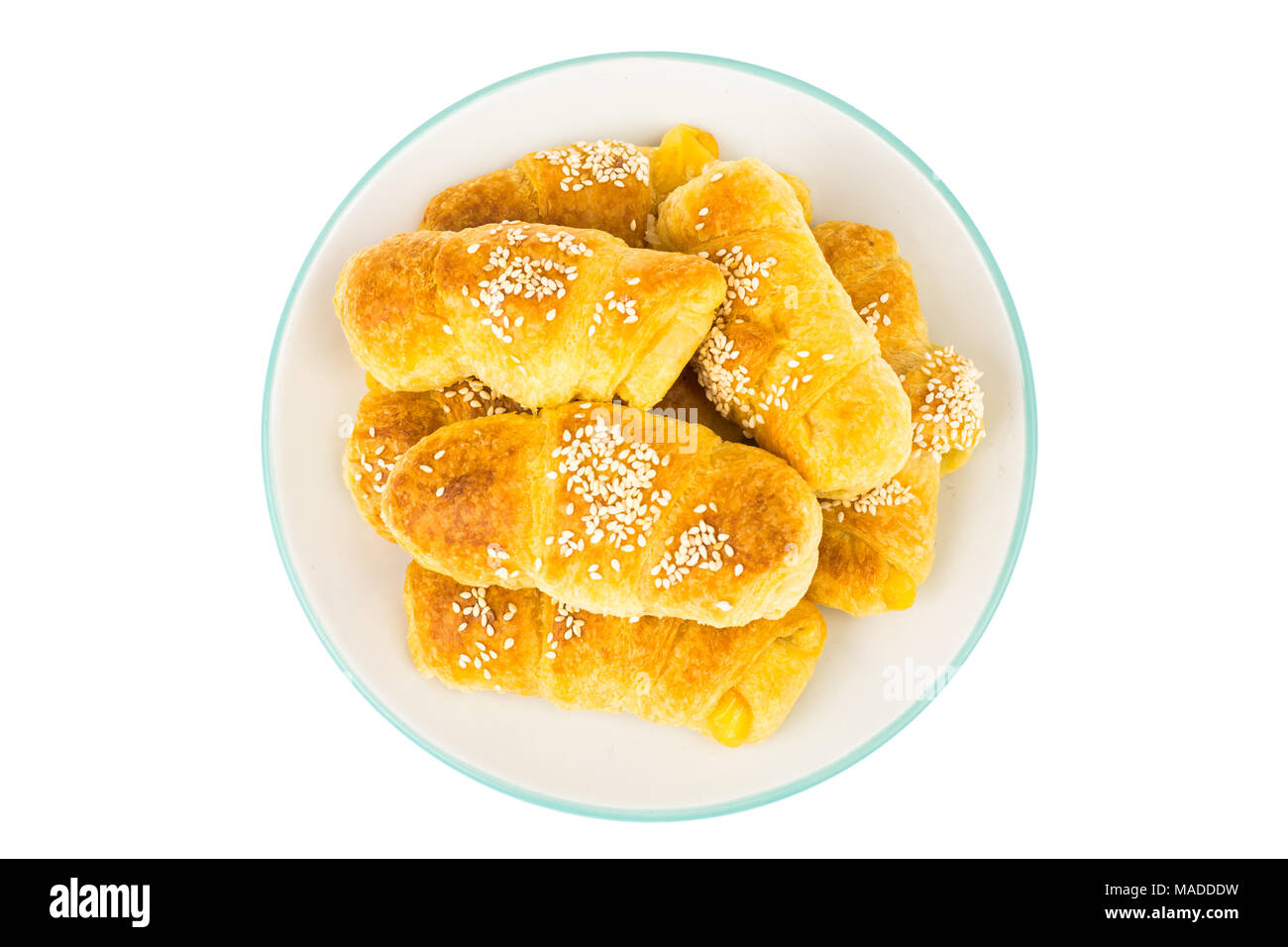 Homemade pastries with puff pastry stuffing with sesame seeds. Studio ...