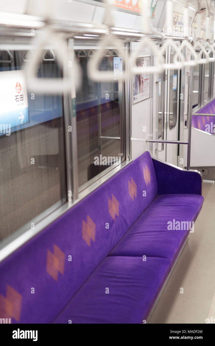 JR train interior with empty purple seats in Kyoto, Japan 2017 Stock ...
