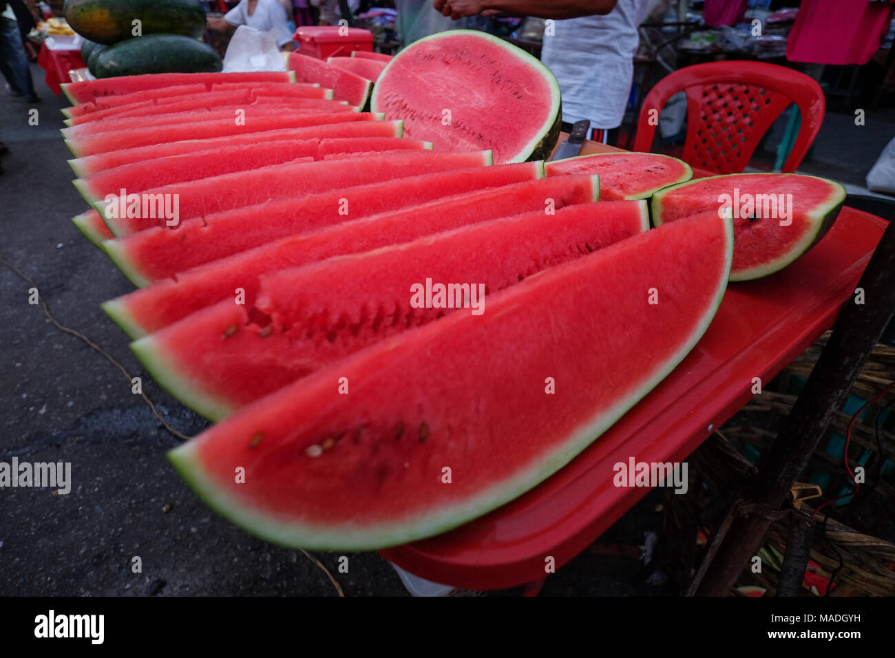 Selling watermelon at local market in Yangon, Myanmar Stock Photo - Alamy