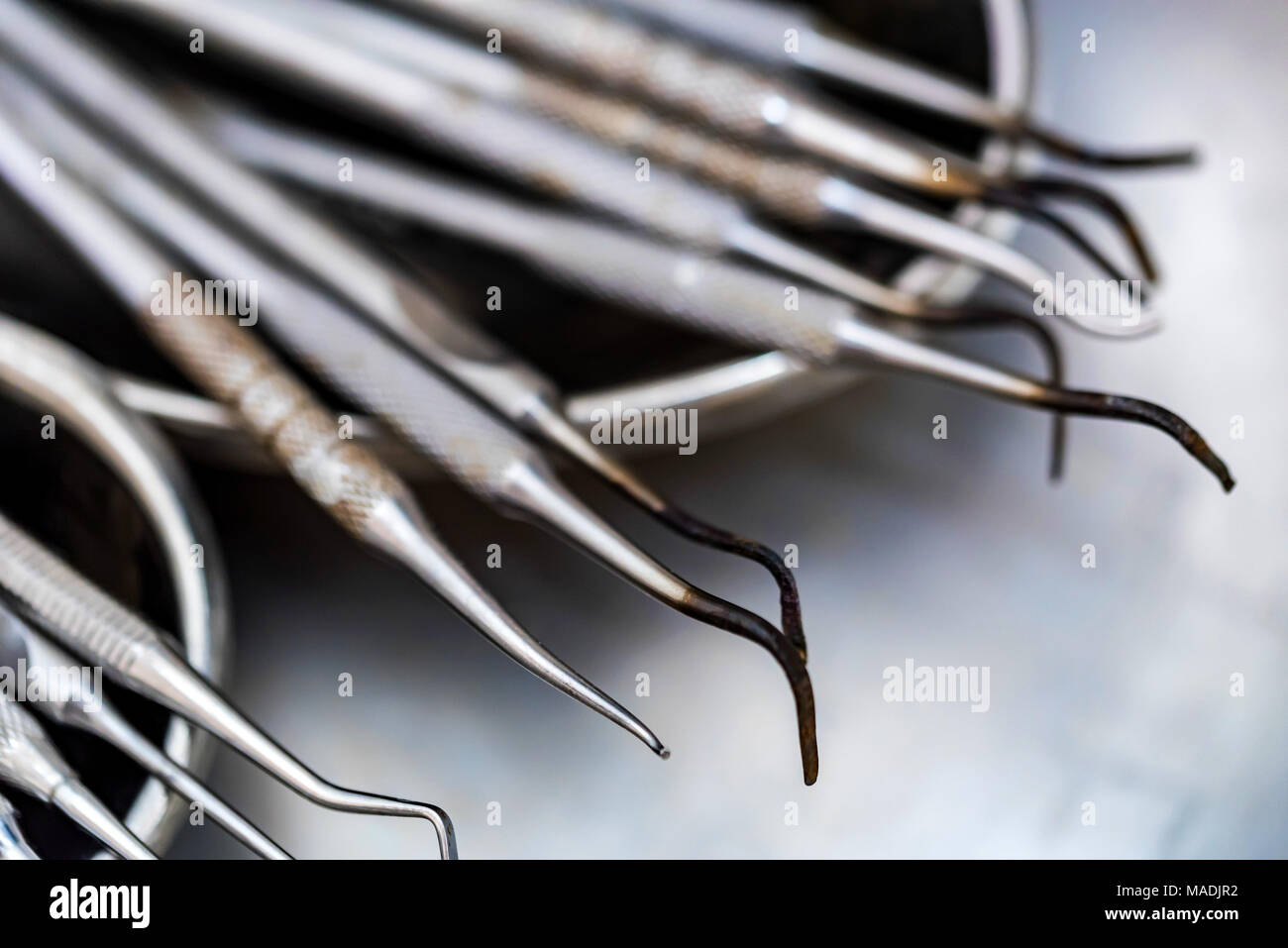 Used medical instruments of dentist Stock Photo - Alamy