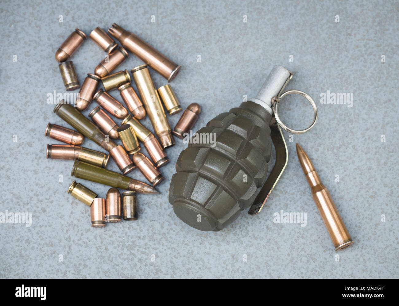 Hand grenade, cartridges and scales from various types of weapons Stock ...