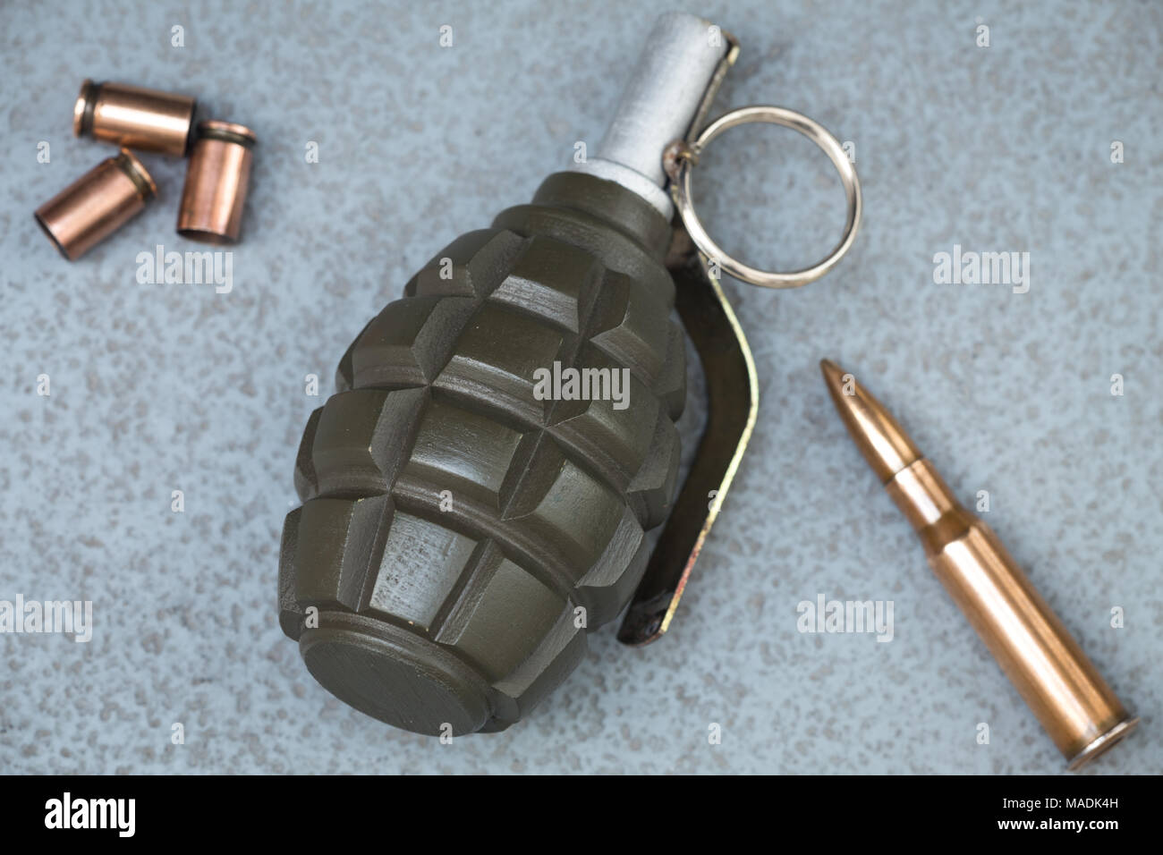 Hand grenade, cartridges and scales from various types of weapons Stock ...