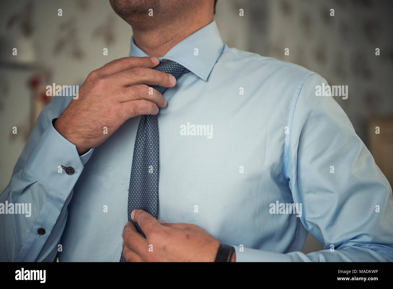 Man adjust tie hi-res stock photography and images - Alamy