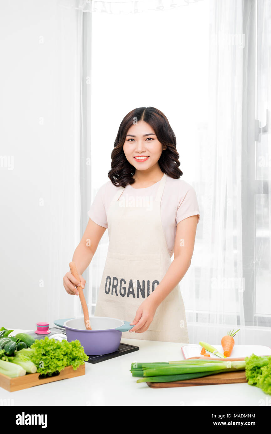 Indian girl cooking hi-res stock photography and images - Alamy