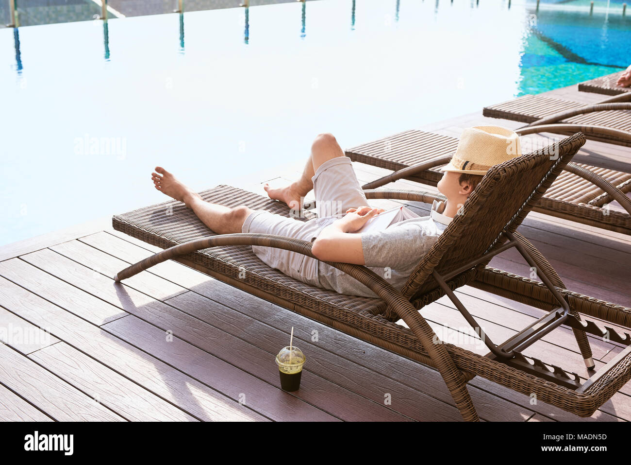 Man Sleeping Swimming Pool High Resolution Stock Photography and Images ...