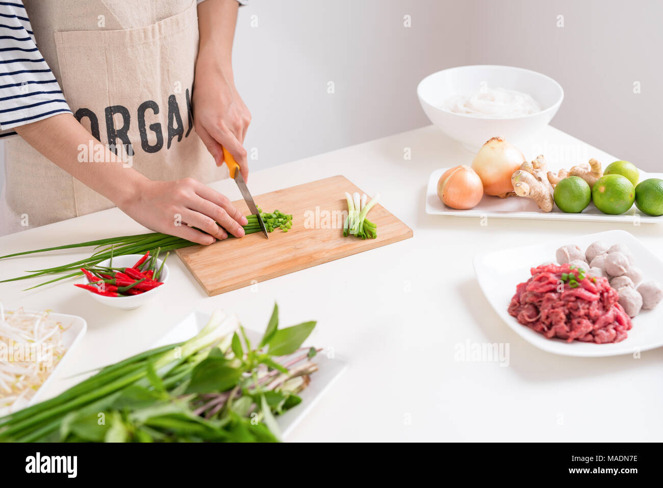 Woman making pho eating pho hi-res stock photography and images - Alamy