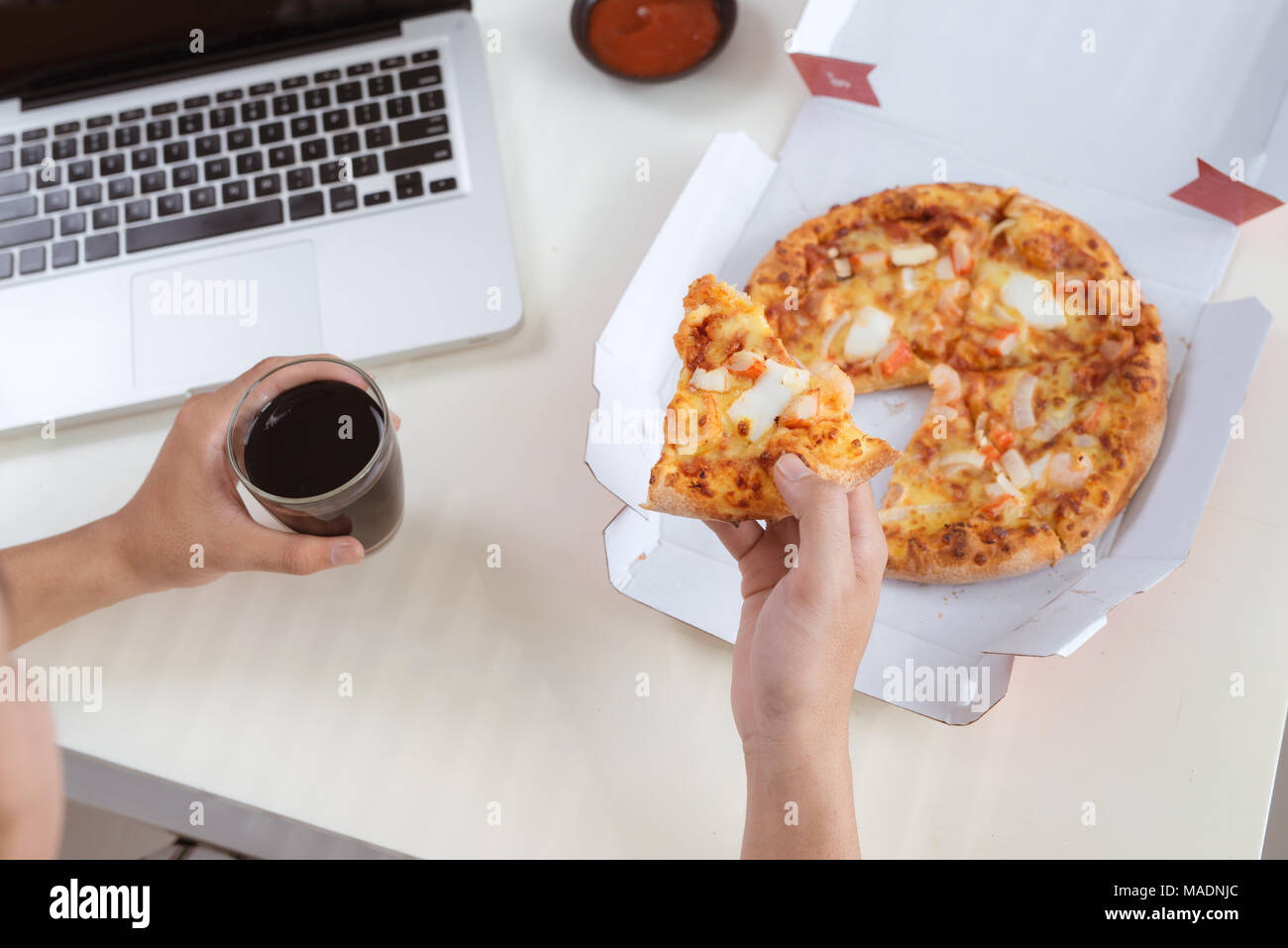 Man hand eating hi-res stock photography and images - Alamy