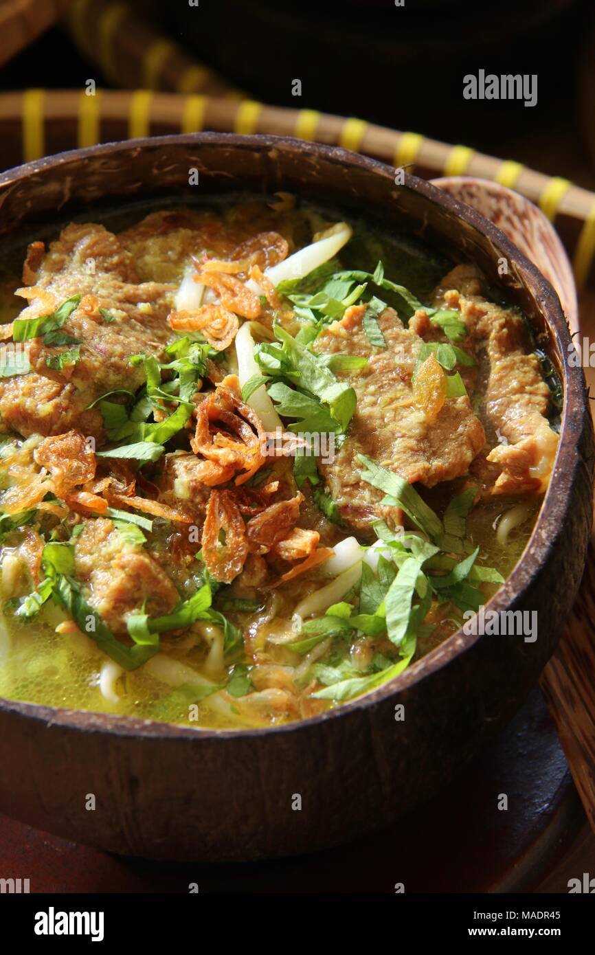 Soto Batok, the Javanese Beef Soup Served in Coconut Shell Bowl Stock ...