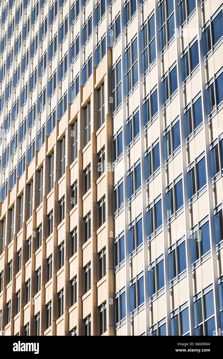 the facade of an office building looking from the ground up to the sky ...