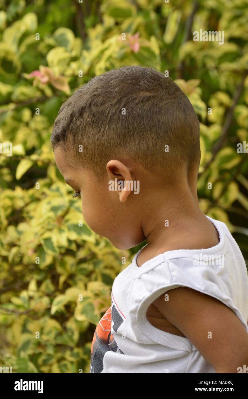 Kid face rear view Stock Photo - Alamy