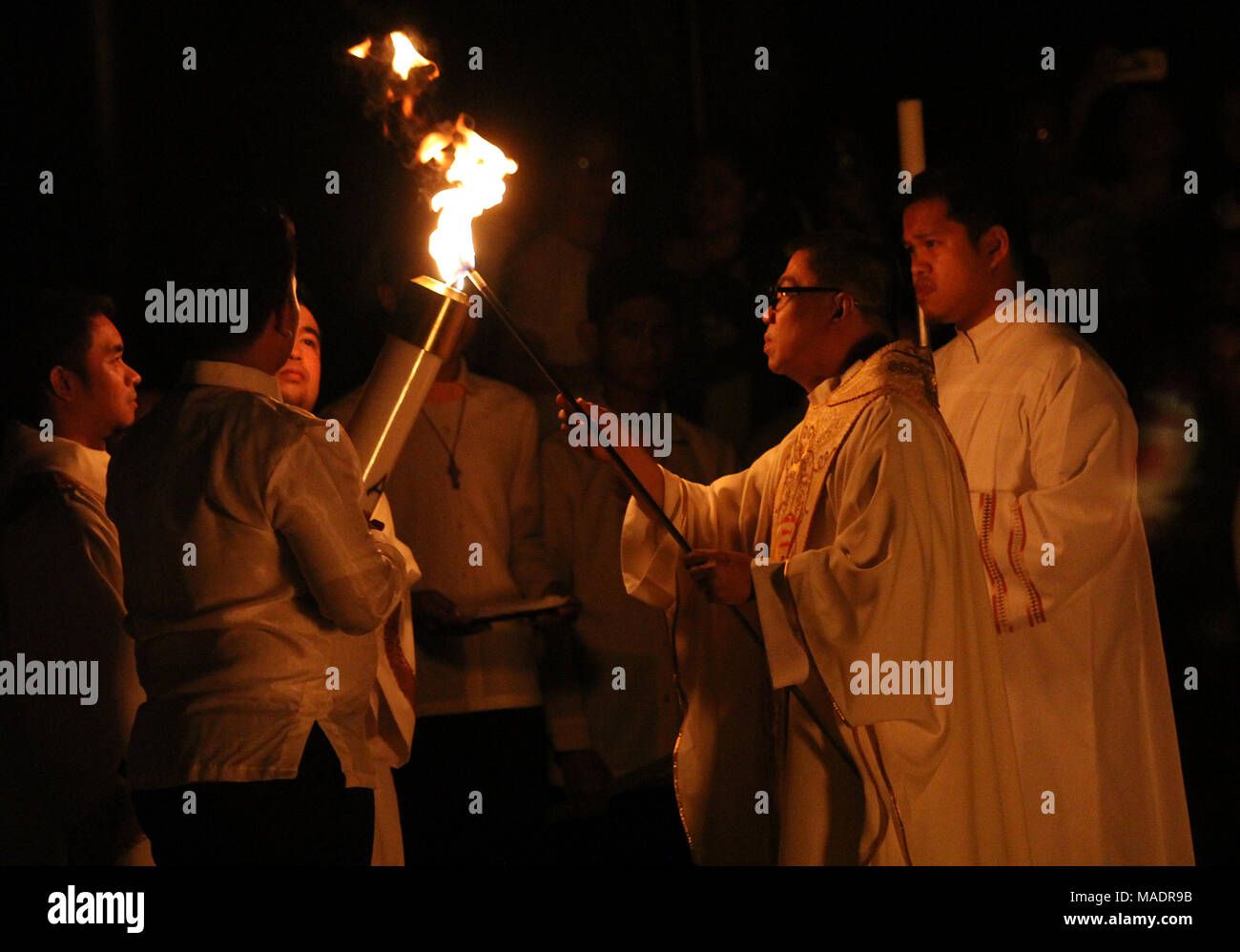 Paschal candle lit hi-res stock photography and images - Alamy