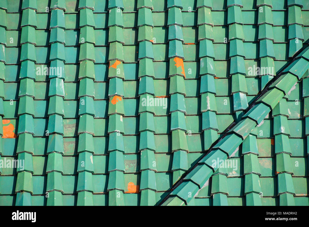 Green tile roof for texture and background Stock Photo - Alamy