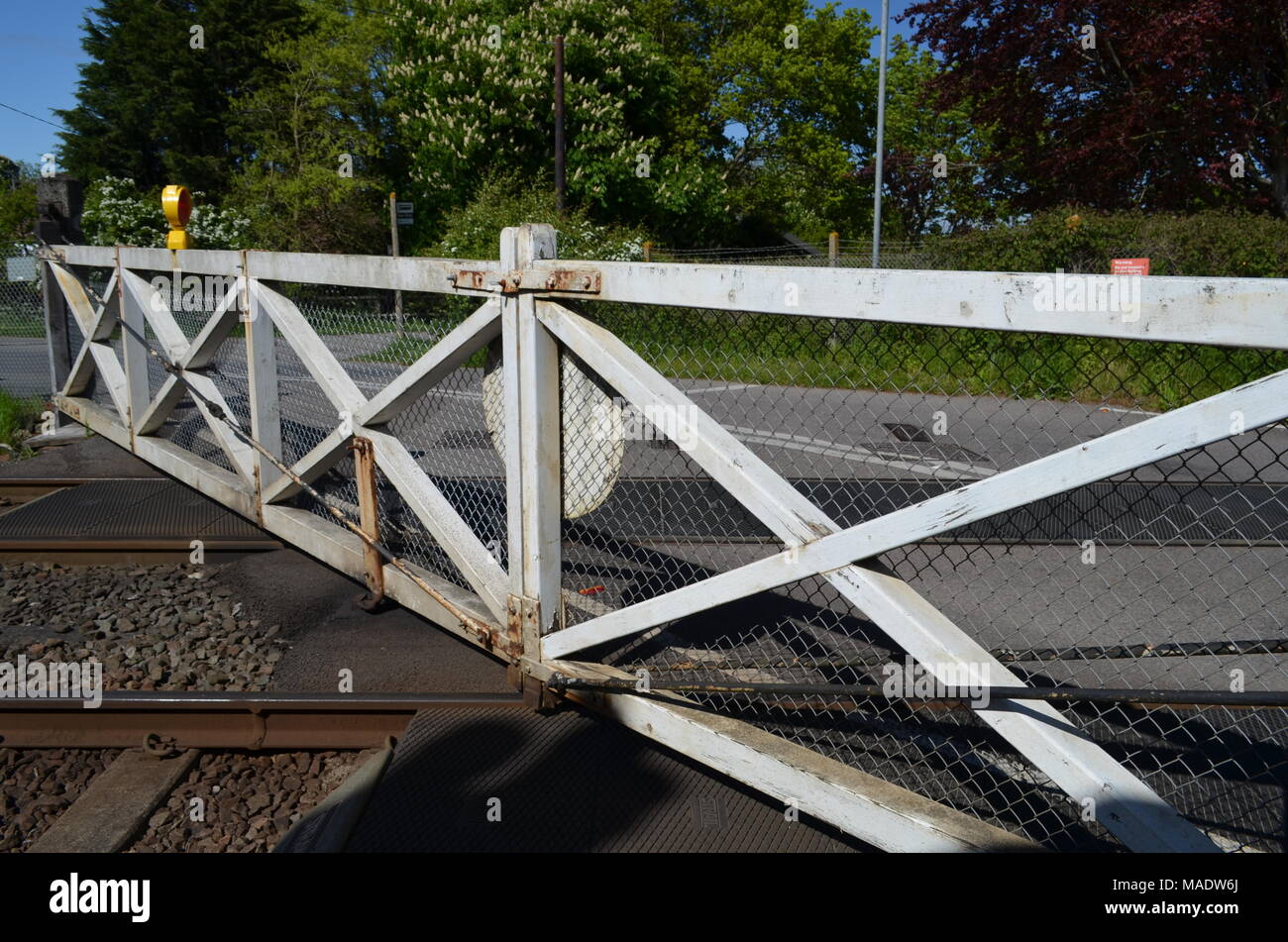 Traditional gated rail crossing hi-res stock photography and images - Alamy