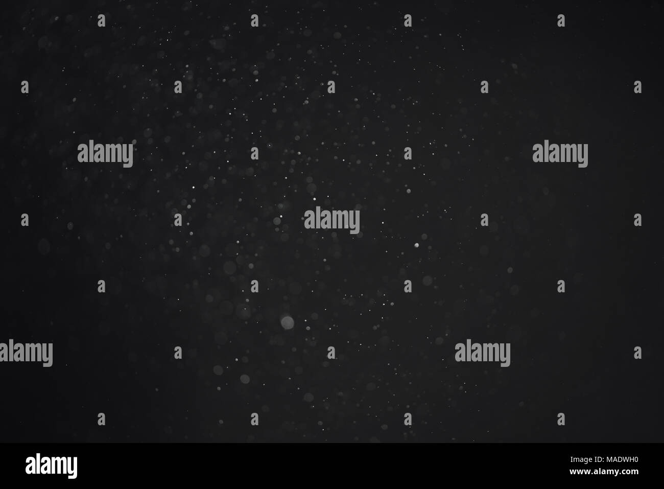 abstract dust particles over black background for overlay, effect Stock Photo - Alamy