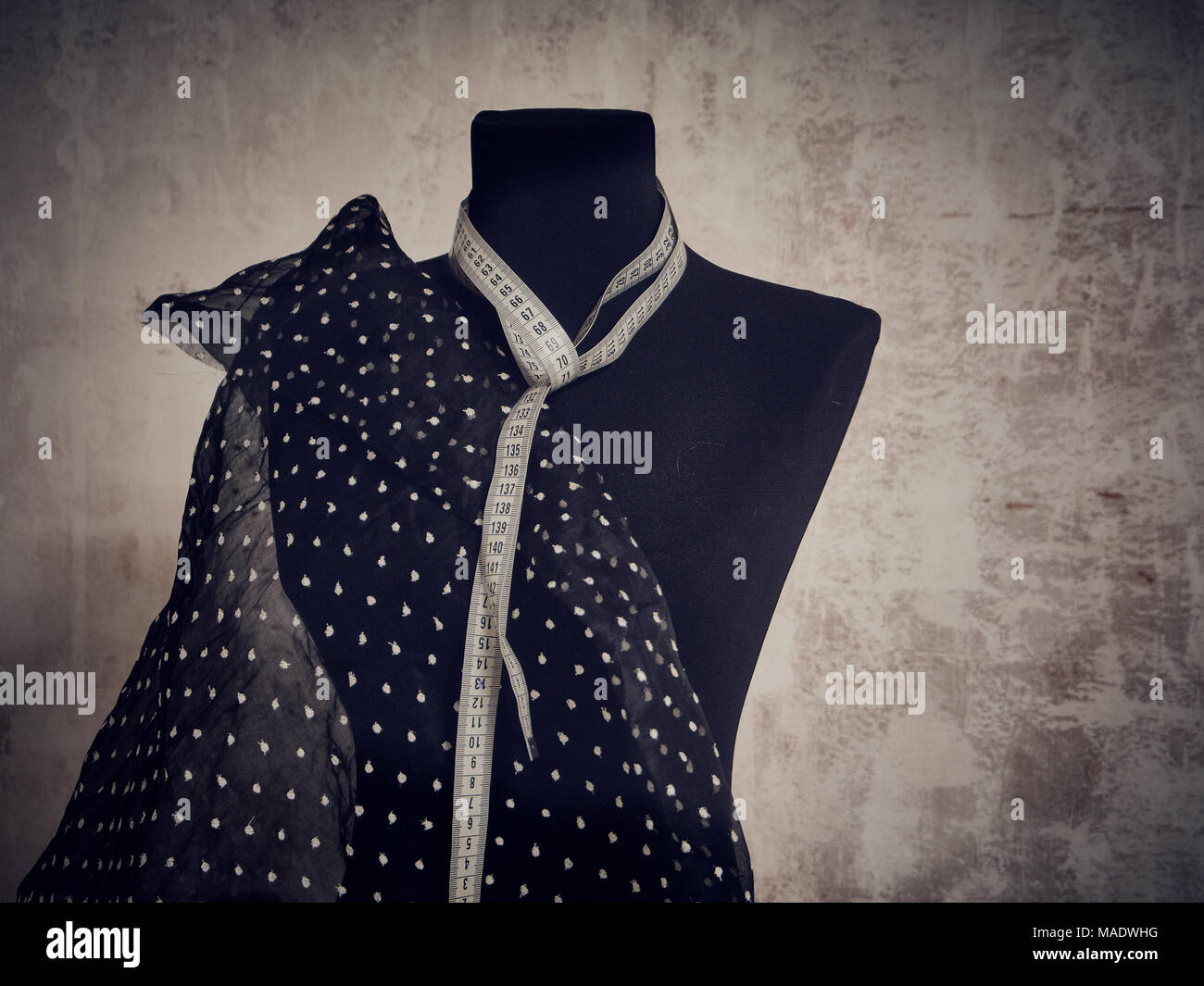 A dummy for fitting and convenience of tailoring, on the neck of which ...