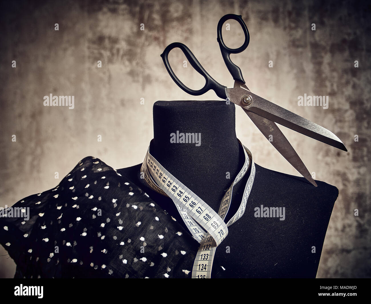 A dummy for fitting and convenience of tailoring, on the neck of which ...