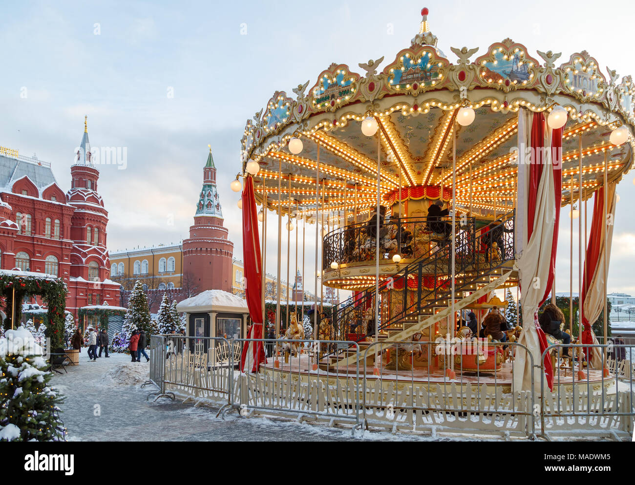 MOSCOW, RUSSIA, FEBRUARY 01, 2018: Tourist photographs a carousel at ...