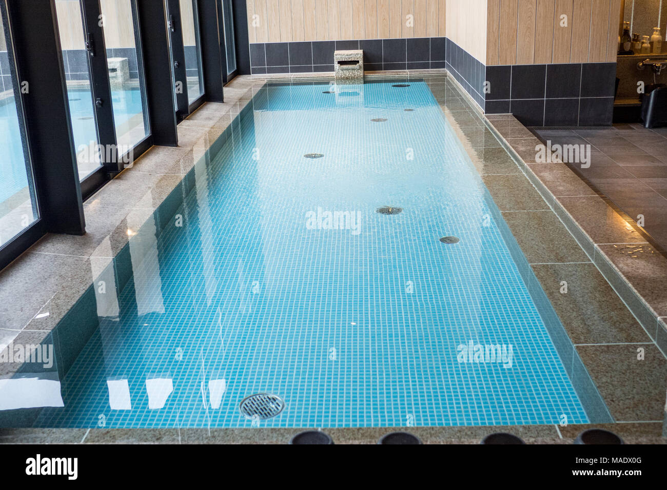 Indoor onsen at the Candeo Hotel in Osaka Stock Photo - Alamy