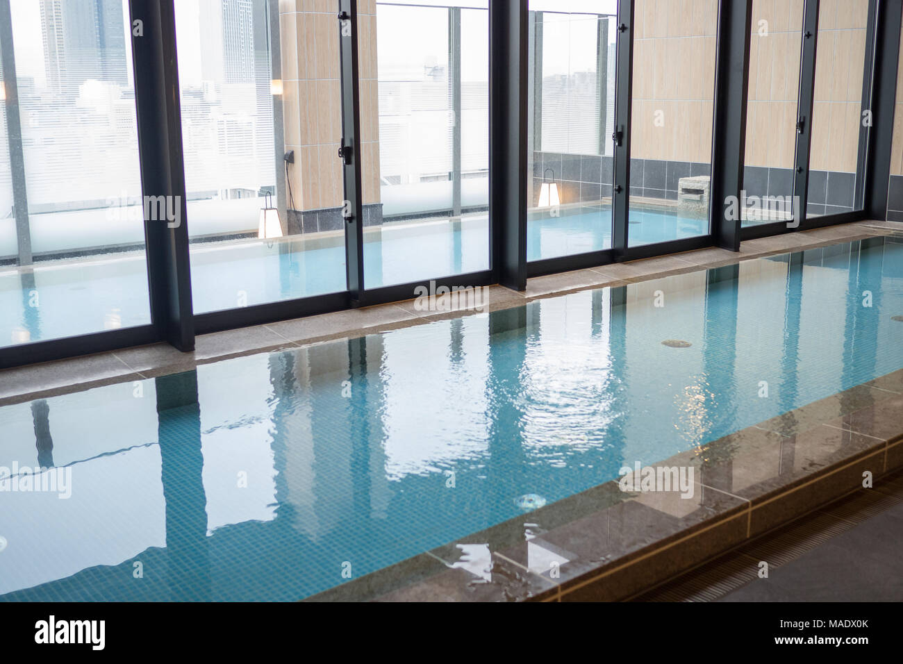 Indoor onsen at the Candeo Hotel in Osaka Stock Photo - Alamy