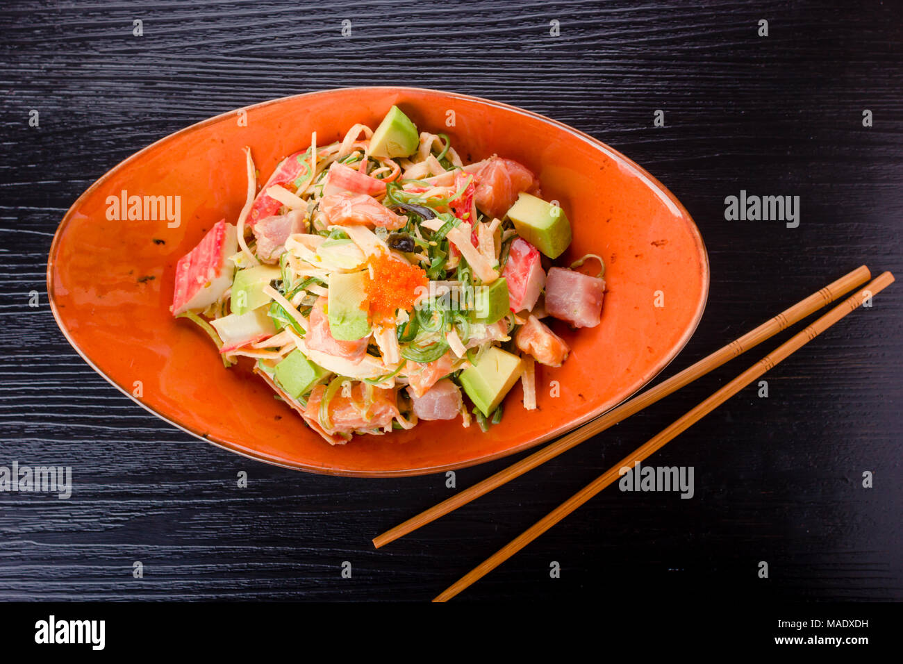 mix of wakame seaweed with dynamite salad and cuts of tuna, salmon, eel ...