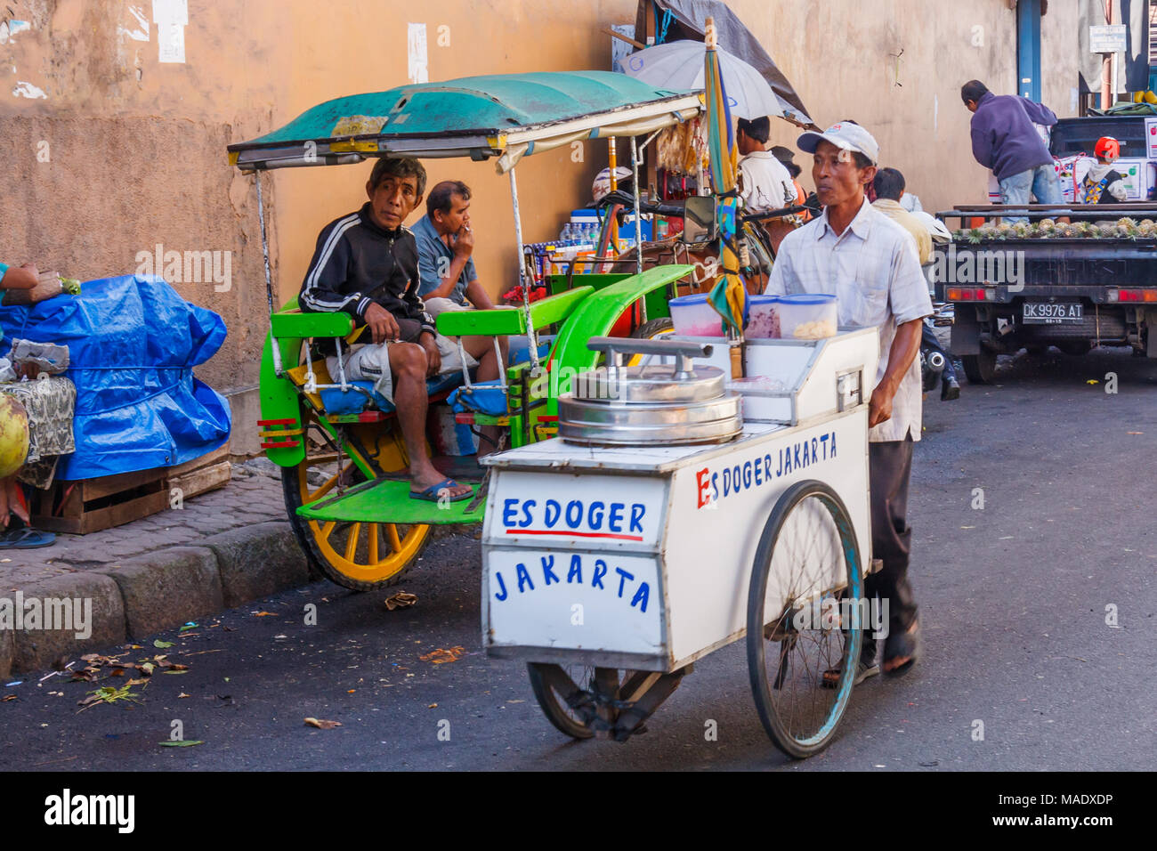 Salesman pushing ice cream cart hi-res stock photography and images - Alamy