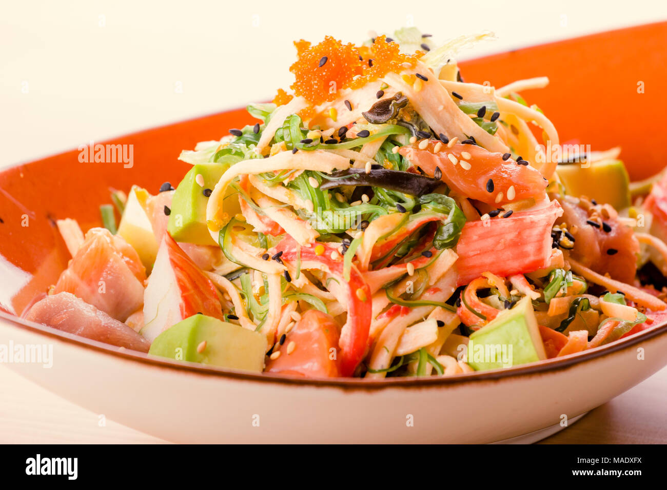 mix of wakame seaweed with dynamite salad and cuts of tuna, salmon, eel ...