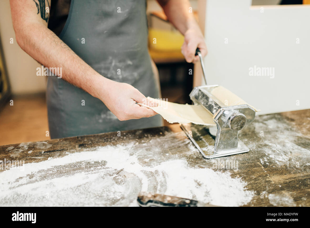Male chef in apron hi-res stock photography and images - Alamy