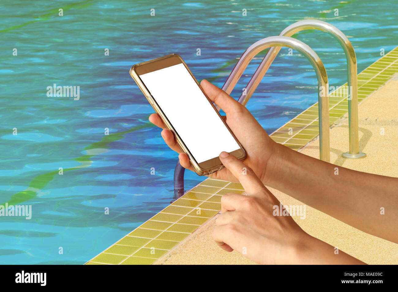 Woman hand hold and touch screen smart phone over ladder of the ...