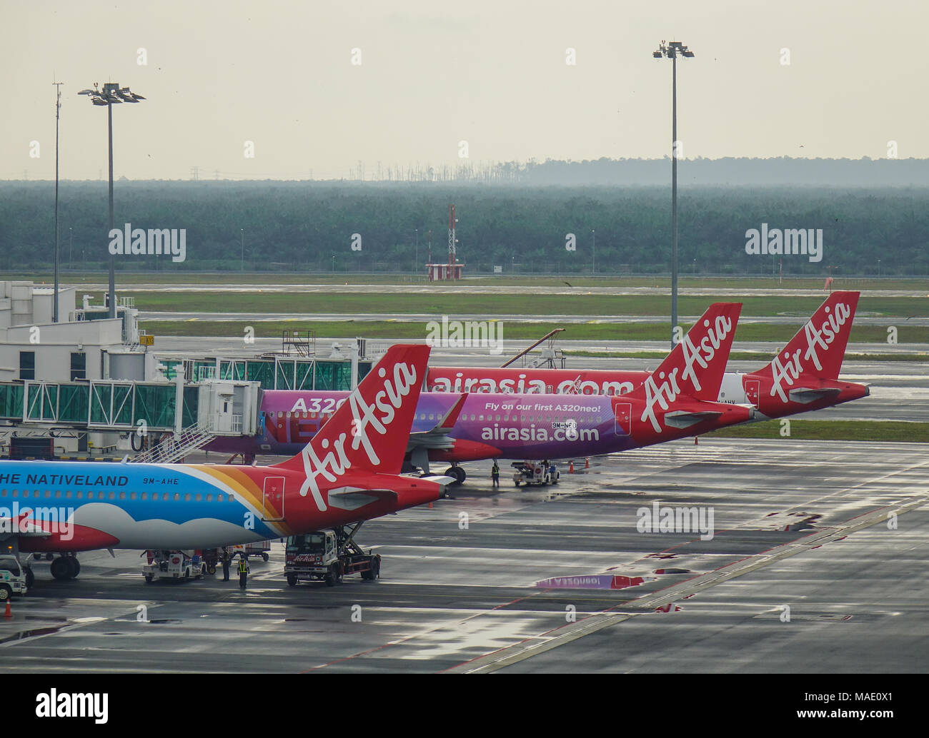 Kuala Lumpur, Malaysia - Jan 17, 2017. AirAsia aircrafts docking at ...