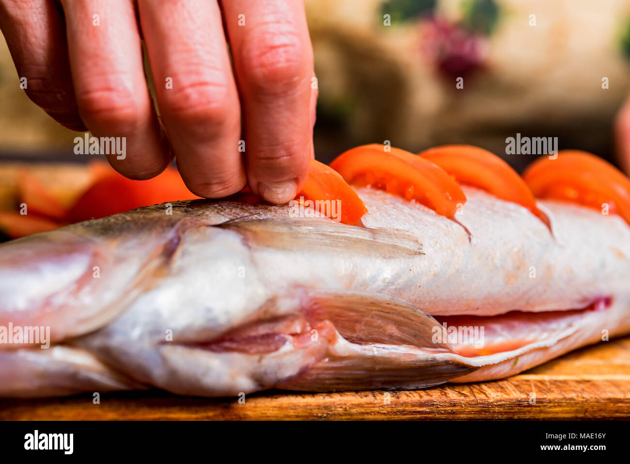 Adding tomato hi-res stock photography and images - Alamy