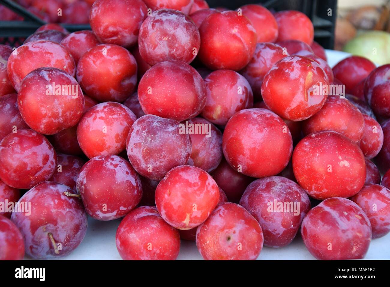Fresh ripe plum sold at the Bazaar Stock Photo - Alamy