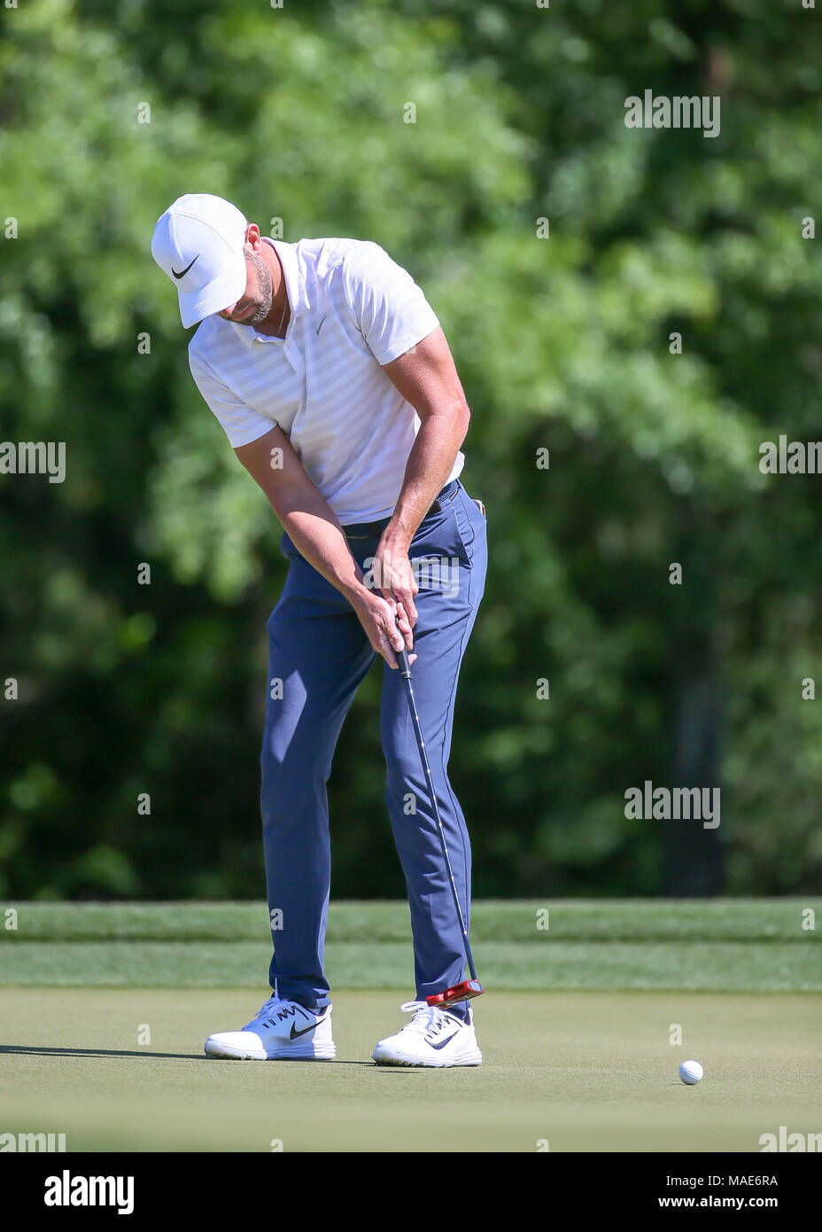 Humble, Texas, USA. 31st Mar, 2018. Kevin Tway (USA) watches his putt ...