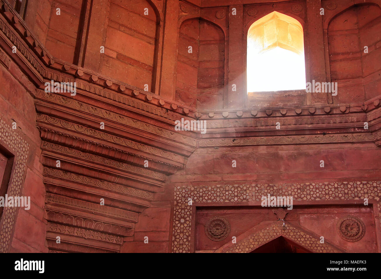 Interior of Jama Masjid with a beam of light coming through the window ...