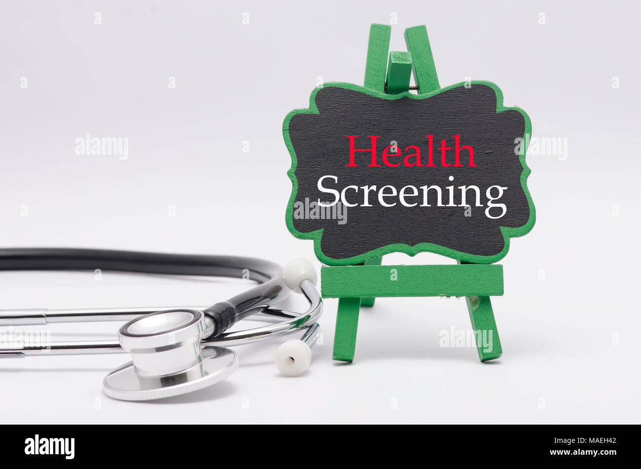 word health screening on wooden easel with stethoscope isolated on ...