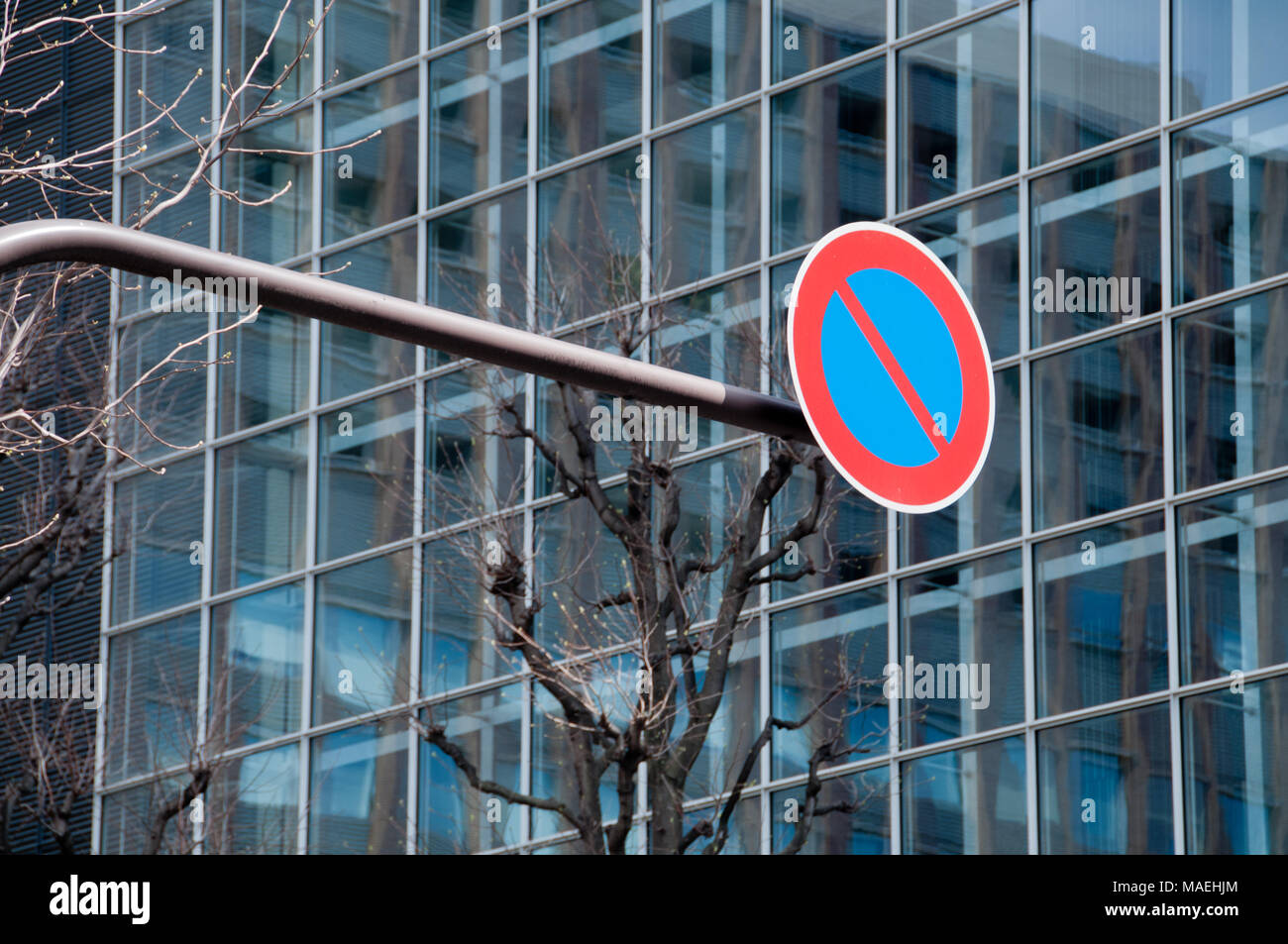 No stop traffic sign pole in city center Stock Photo - Alamy