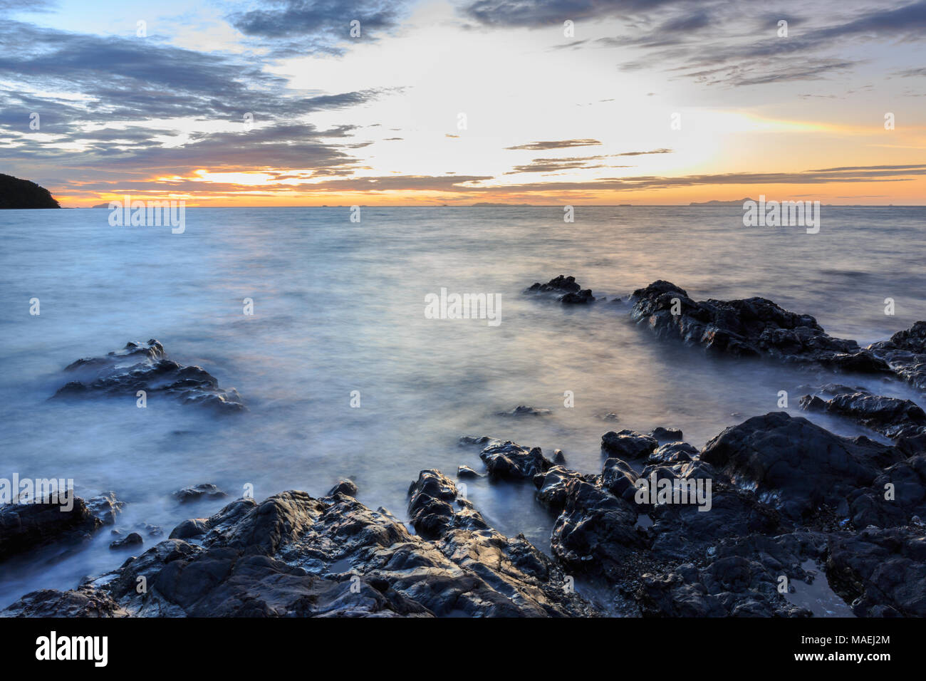 Beautiful twilight over the sea and Golden sky Stock Photo - Alamy