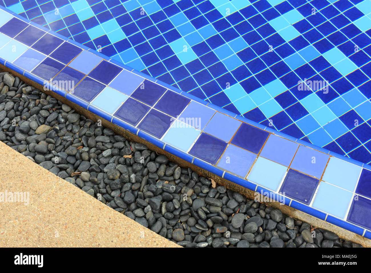 pathway besides swimming pool Stock Photo - Alamy