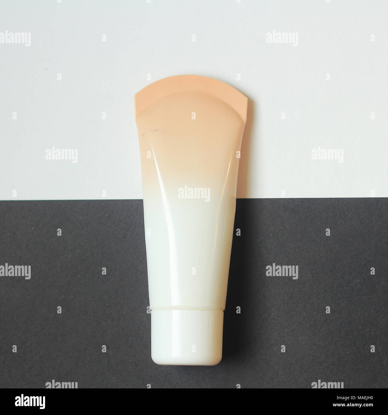close up. tube of Foundation cream on black - white background Stock ...