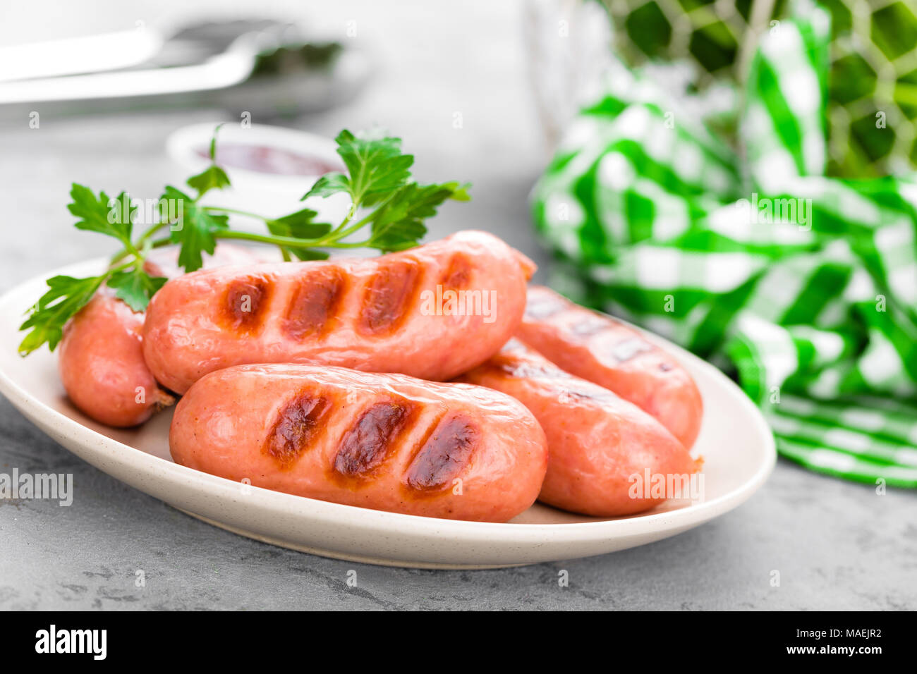 Roasted sausages in plate hi-res stock photography and images - Alamy