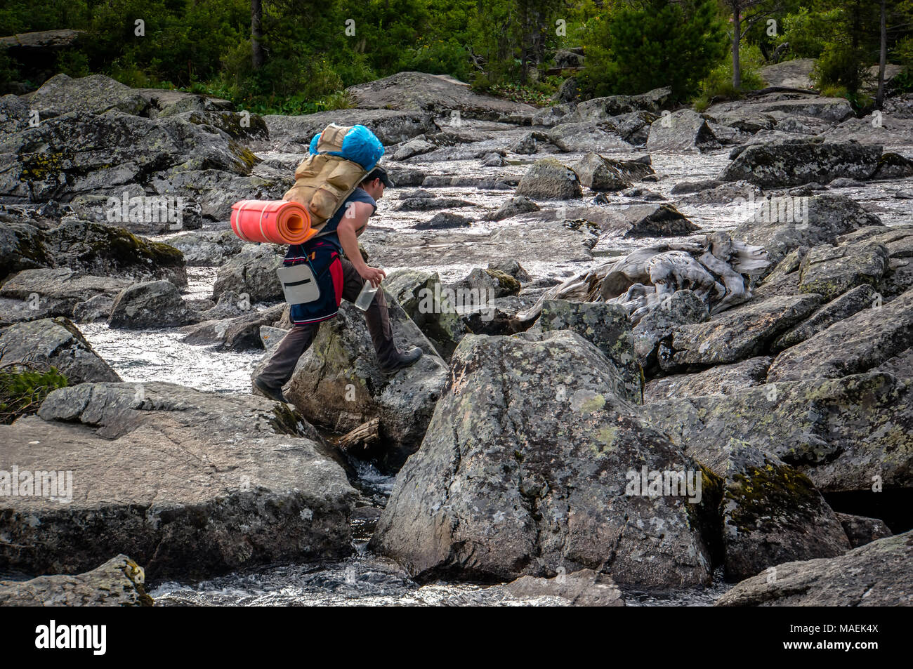 Man and woman with backpack hi-res stock photography and images - Alamy