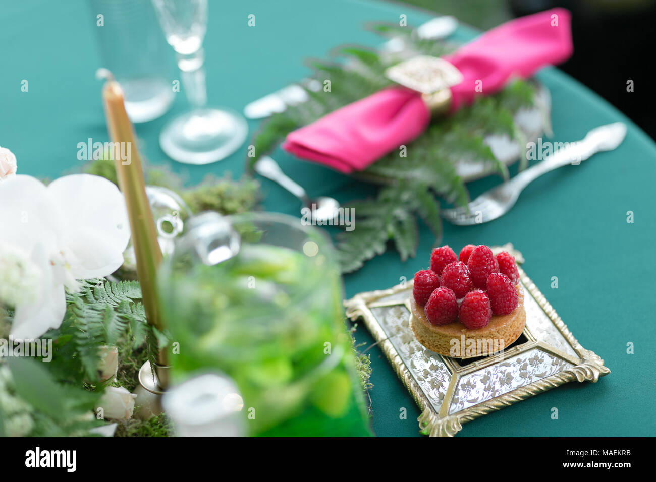 Raspberry dessert. table setting. Wedding decor in the magic forest for ...