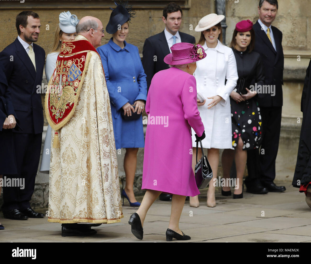 Members of the Royal family watch as the Dean of Windsor David Conner ...