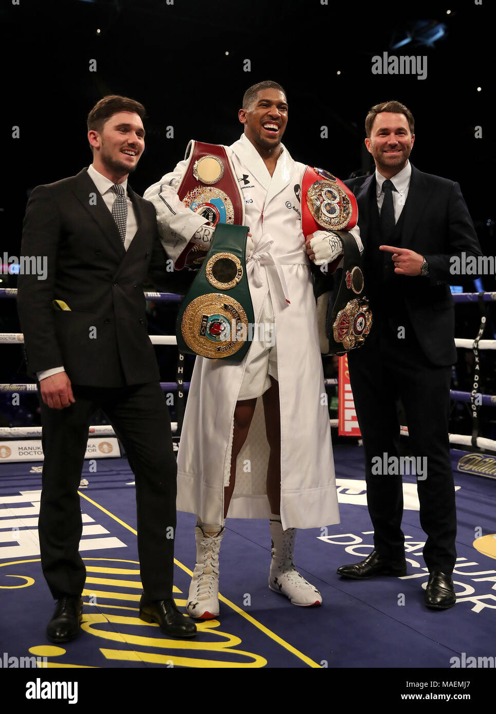 Anthony Joshua and promoter Eddie Hearn (right) after victory over Joseph Parker in their WBA ...
