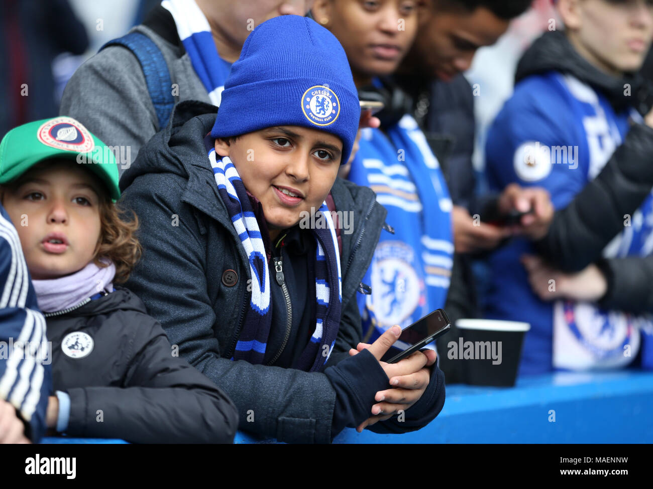 A Chelsea fan in the stands during the Premier League match at Stamford ...