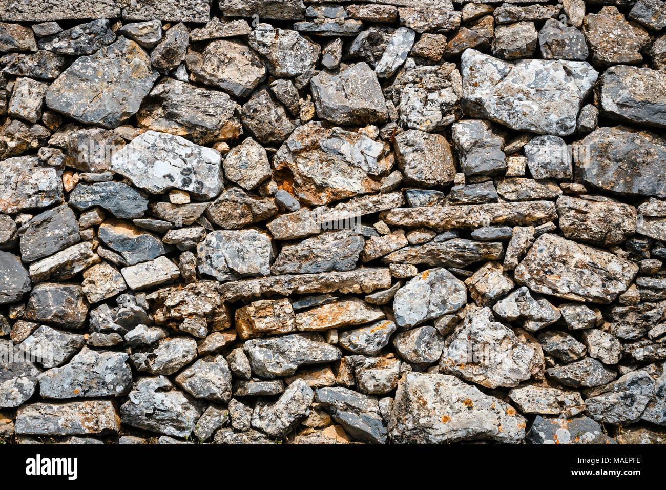 Stone wall can use as backround, close up Stock Photo - Alamy